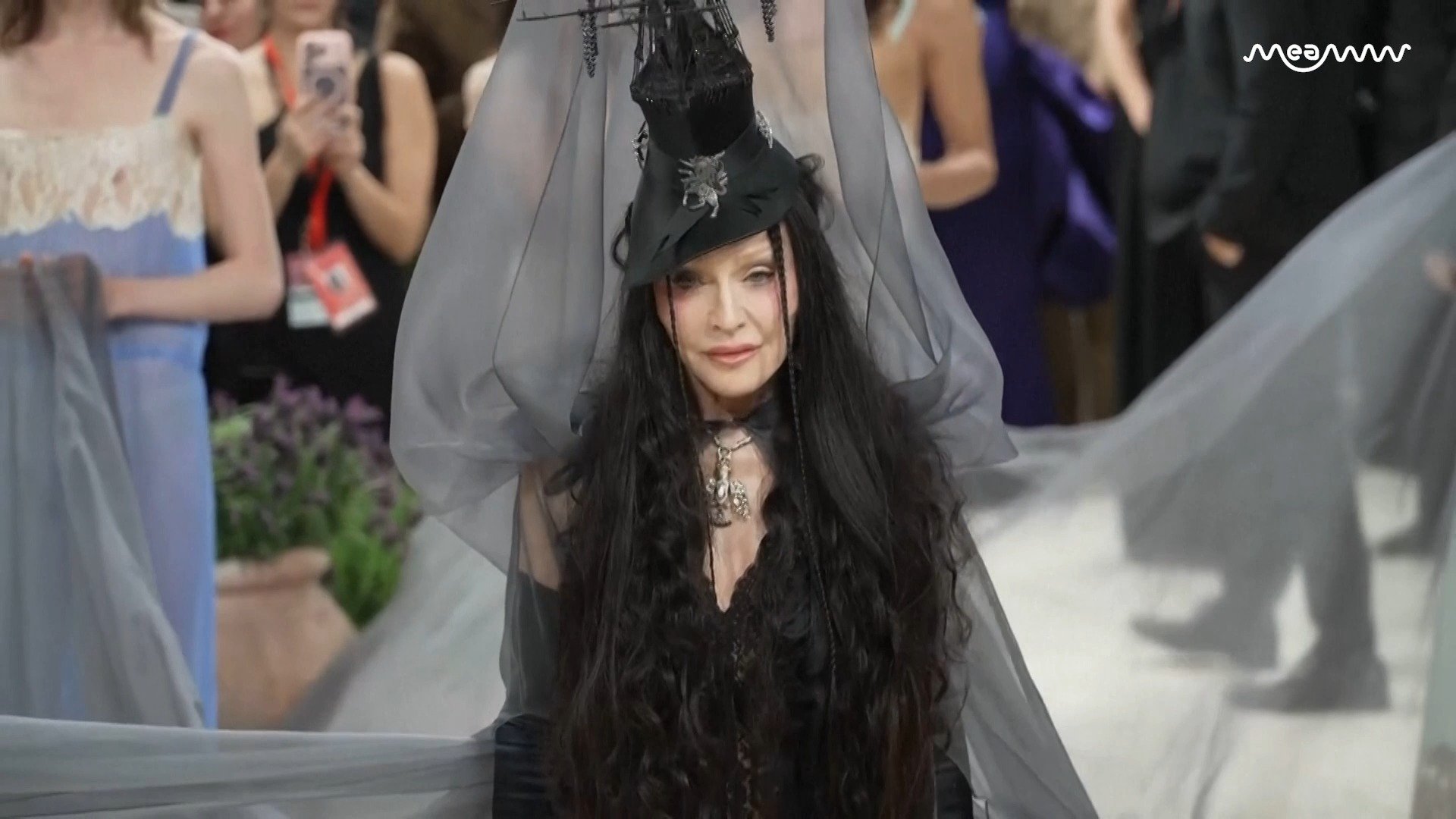Madonna enlists seven blindfolded helpers for witchy Met Gala entrance