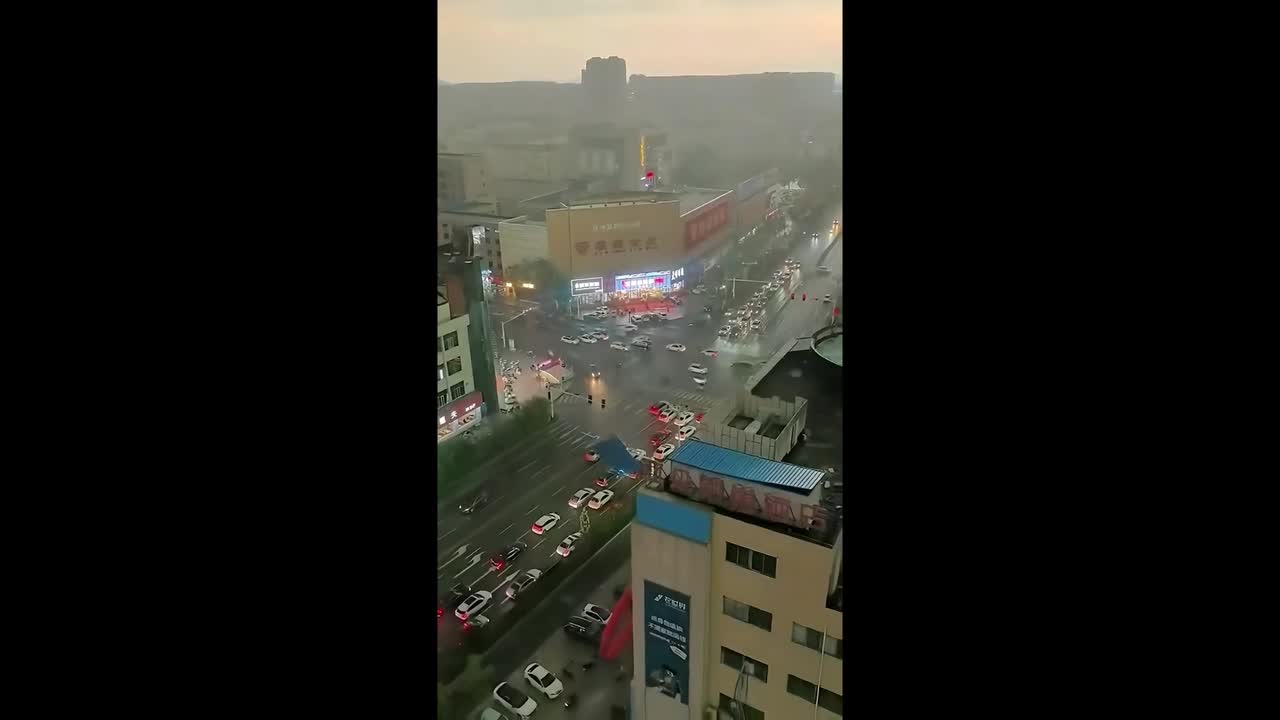 Steel sheets ripped off roofs by strong winds crush passing cars on ...