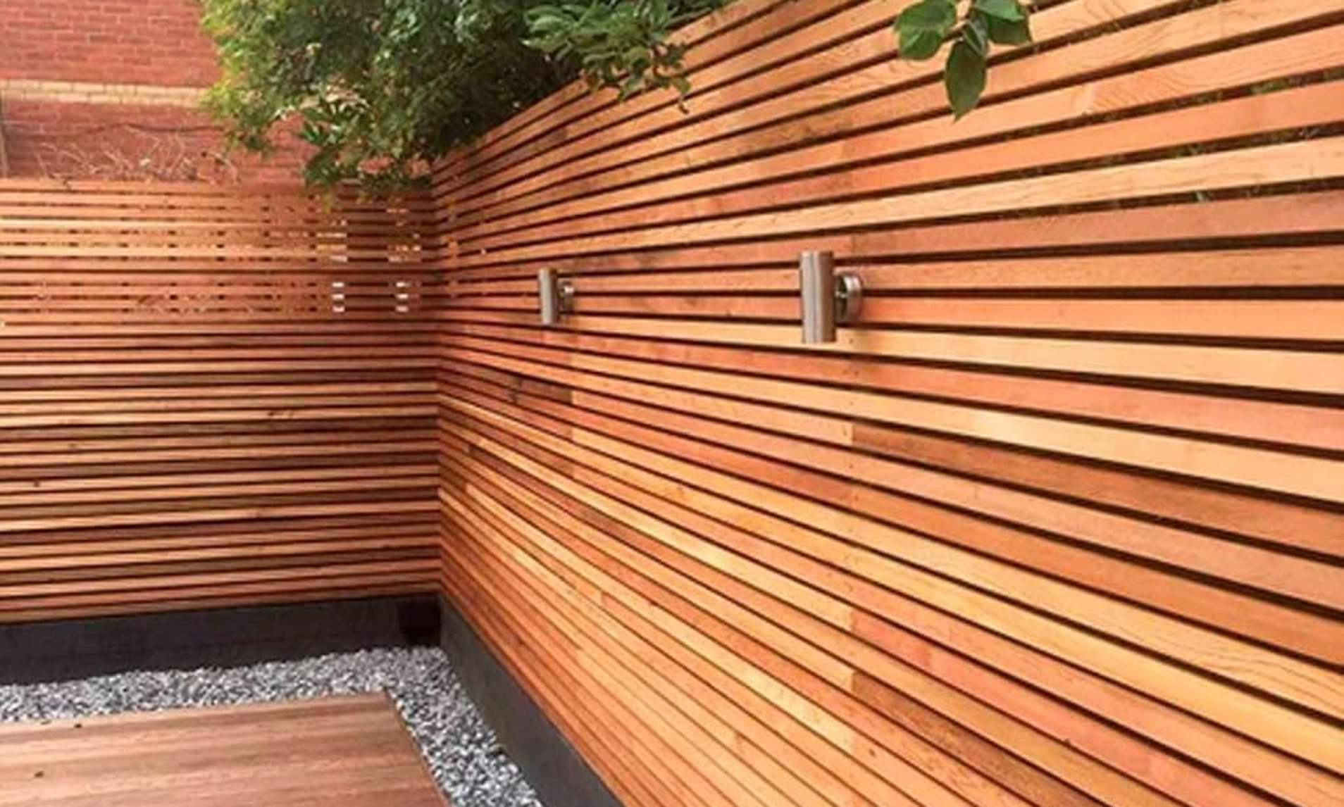 What your fence says about you, including why grey paint screams bad taste