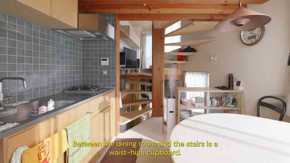 This house is squeezed into a tiny gap – and people live here
