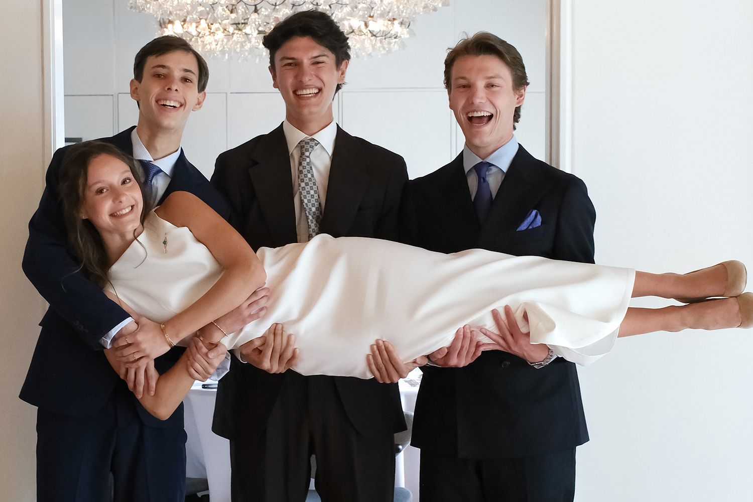 Countess Athena of Denmark, 14, gets a lift from her 3 brothers in ...