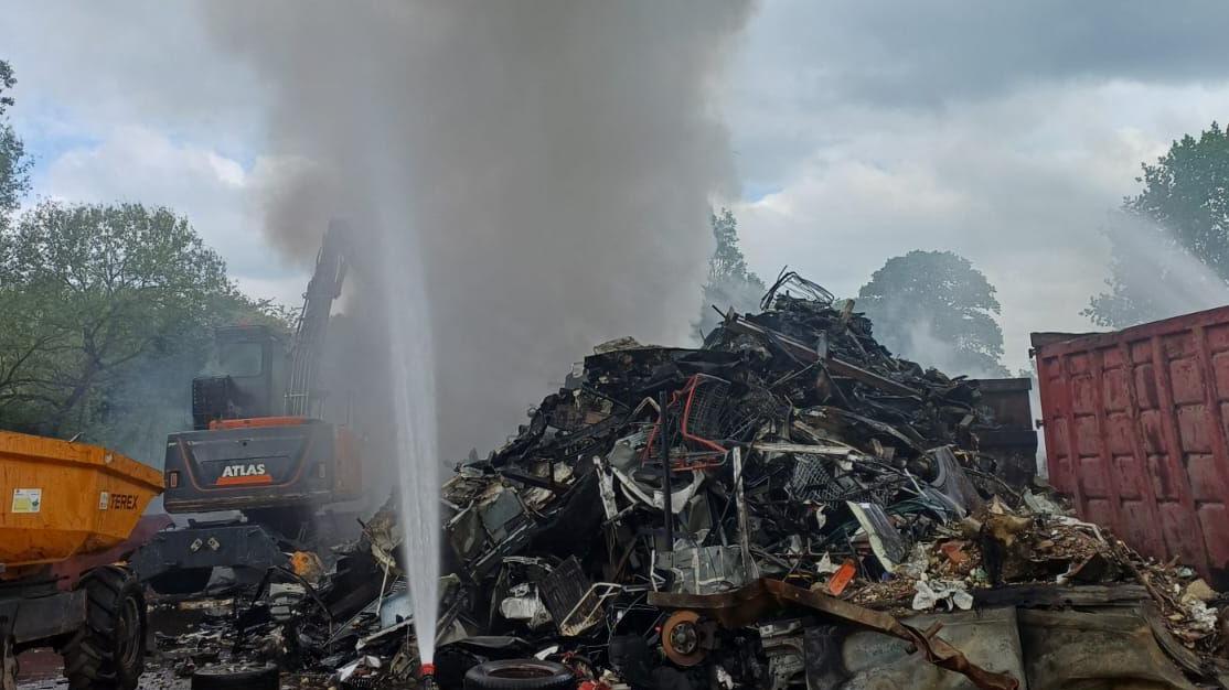 Crews tackle fire involving 80 tonnes of scrap metal
