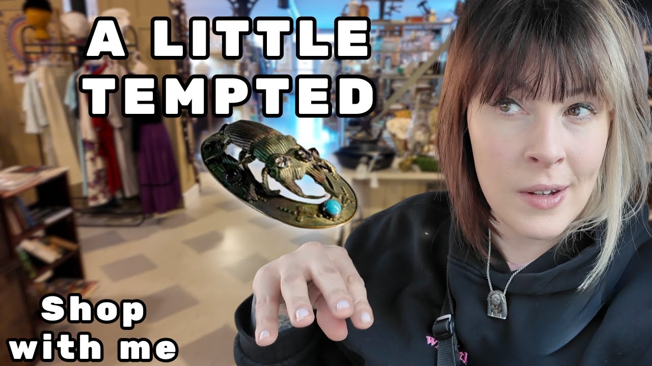 Enthusiastic hobbyist searches local booths for antique insect decor