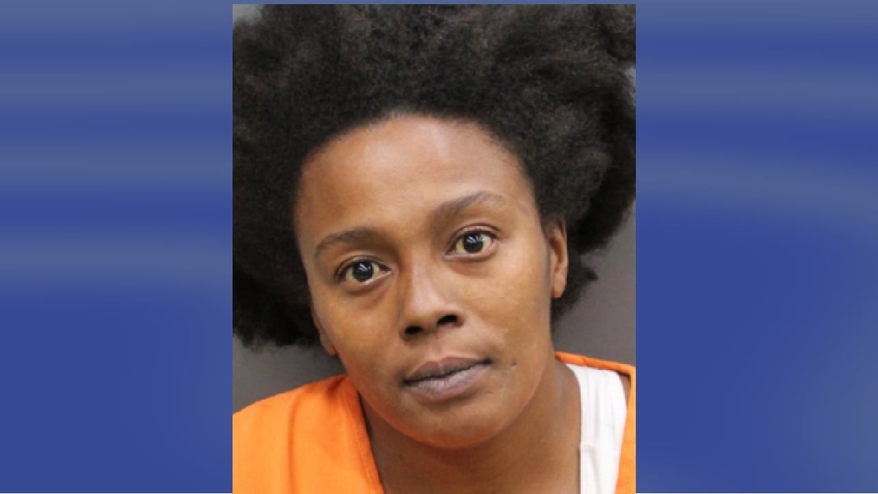 Video captures woman accused of throwing, kicking small dog