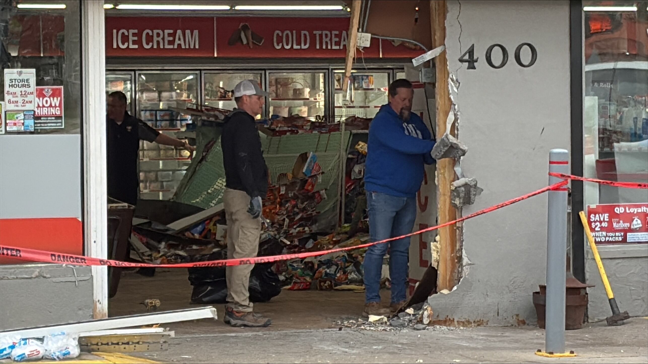 Vehicle crashes into Quality Dairy store in Lansing