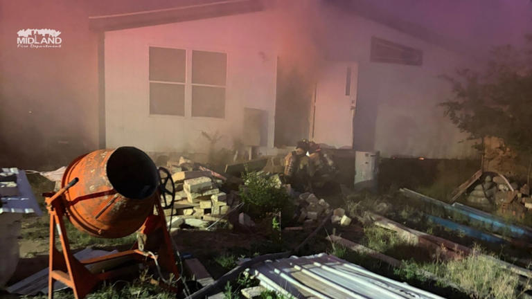 House fire in Midland displaces seven, including child