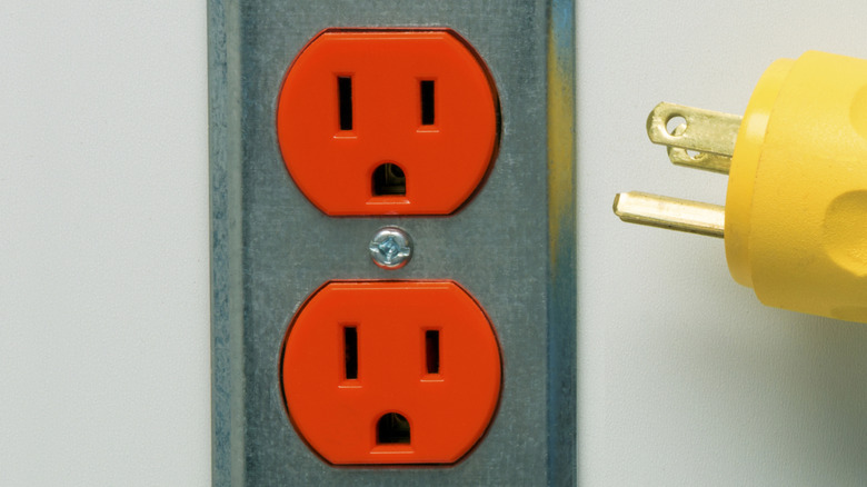 Why are some outlets orange? Here's what it means