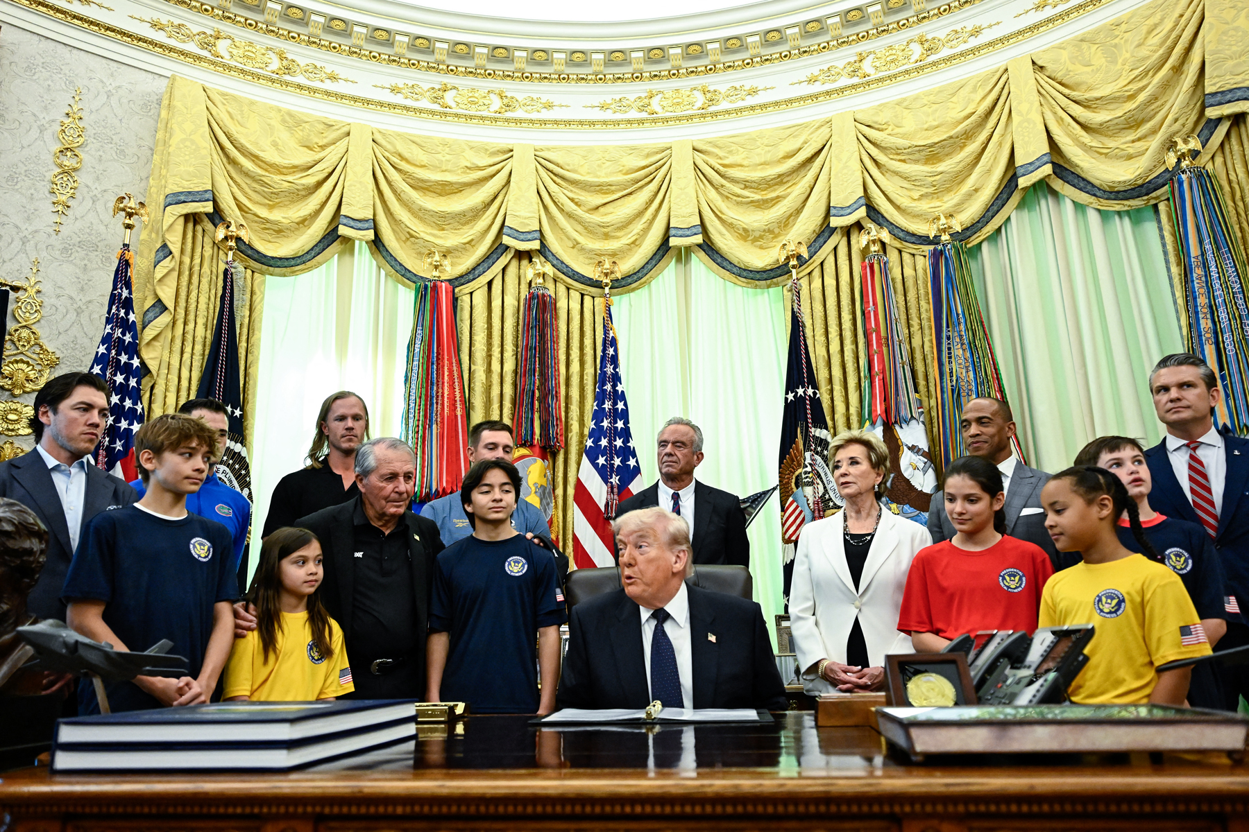 Trump Rants to Children About Iran War, Trans Athletes