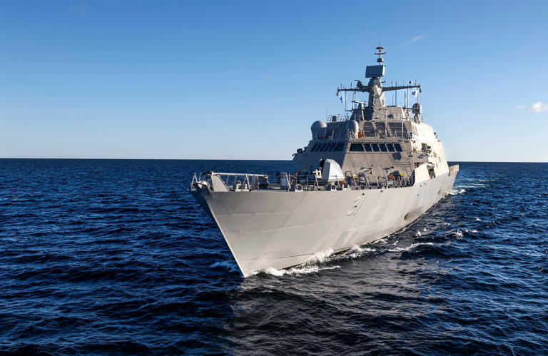 'Man our ship and bring her to life!': USS Cleveland arrives downtown ...