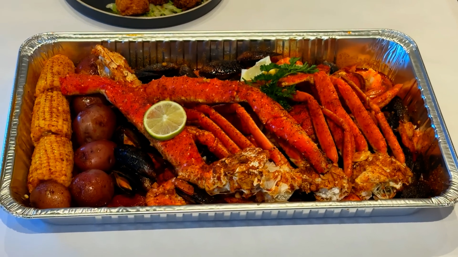 Man eats $140 seafood platter meant for 4 people and adds even more food