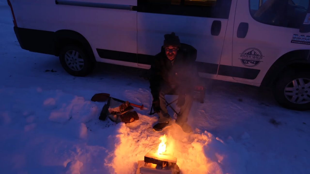 I built a fire pit in the ice at my Alaska campsite