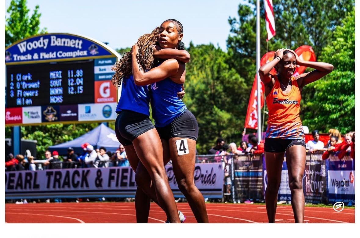 Meridian track team brings home medals, school record from state meet