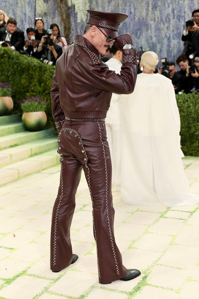 Luke Evans sends fans wild as he poses shirtless in leather Met Gala hat