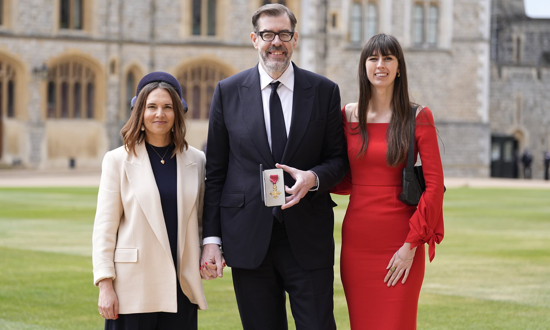 Richard Osman receives OBE as he says he's proud to be from Britain