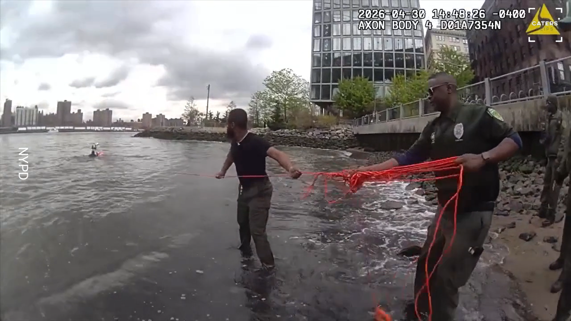 NYPD officers jump into river to rescue woman and cat near Brooklyn Bridge