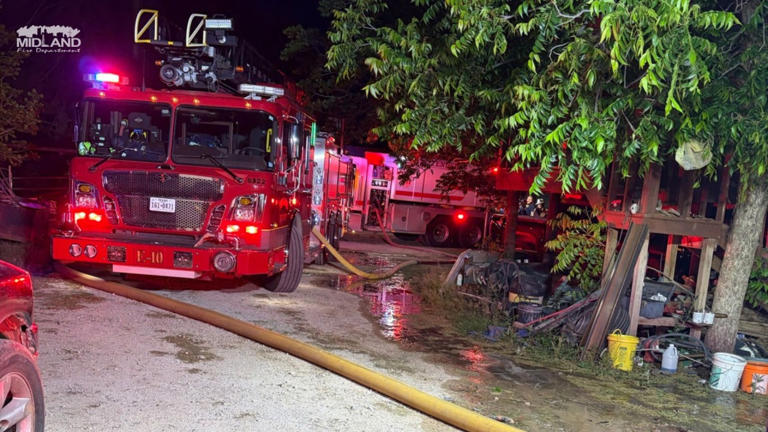 House fire in Midland displaces seven, including child