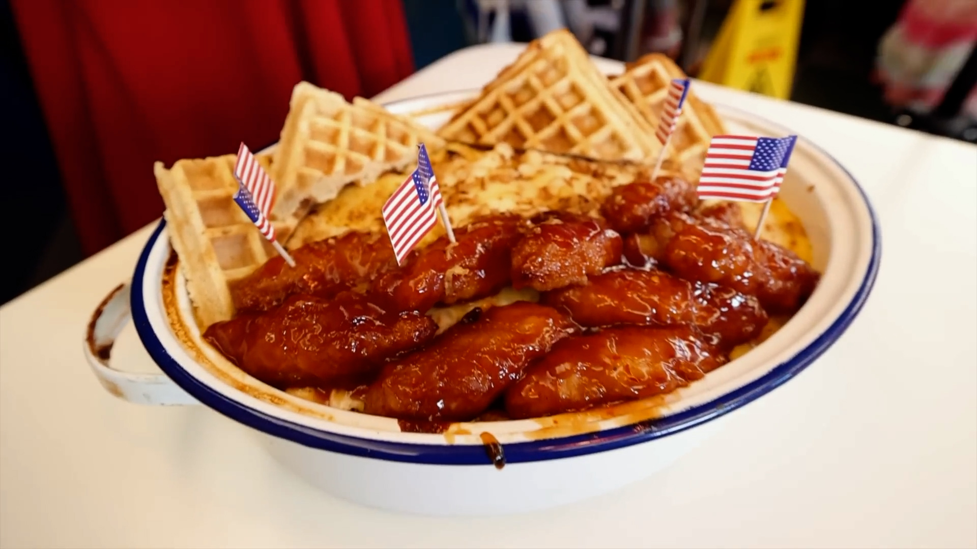 Woman attempts 8lb mac and cheese challenge topped with chicken and waffles