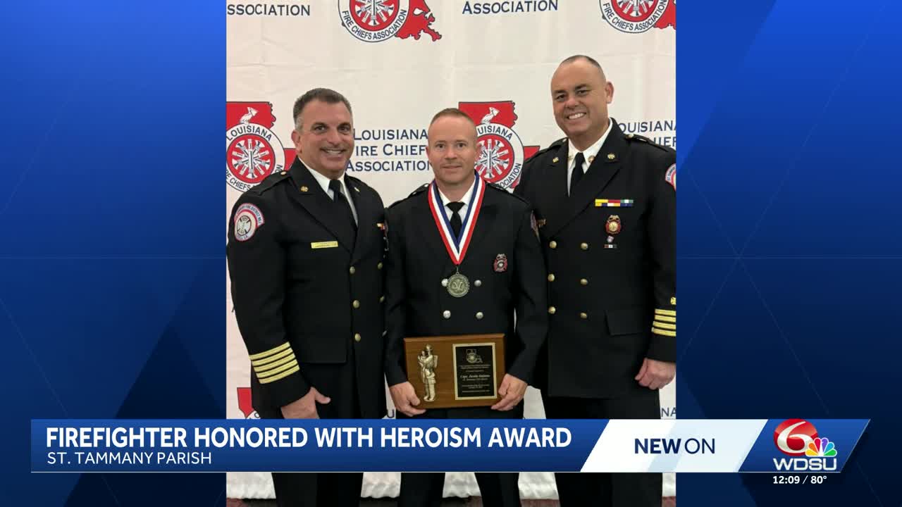 Slidell firefighter who saved man from submerged truck receives ...
