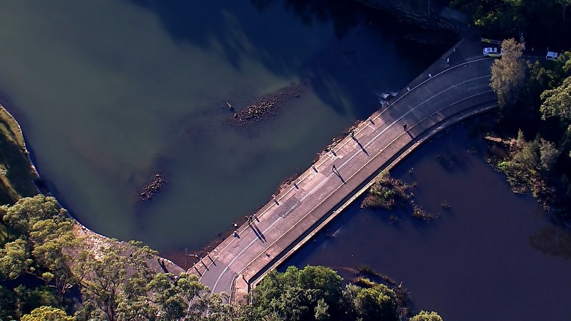 Police divers search for man inside submerged car at Sydney's Royal ...