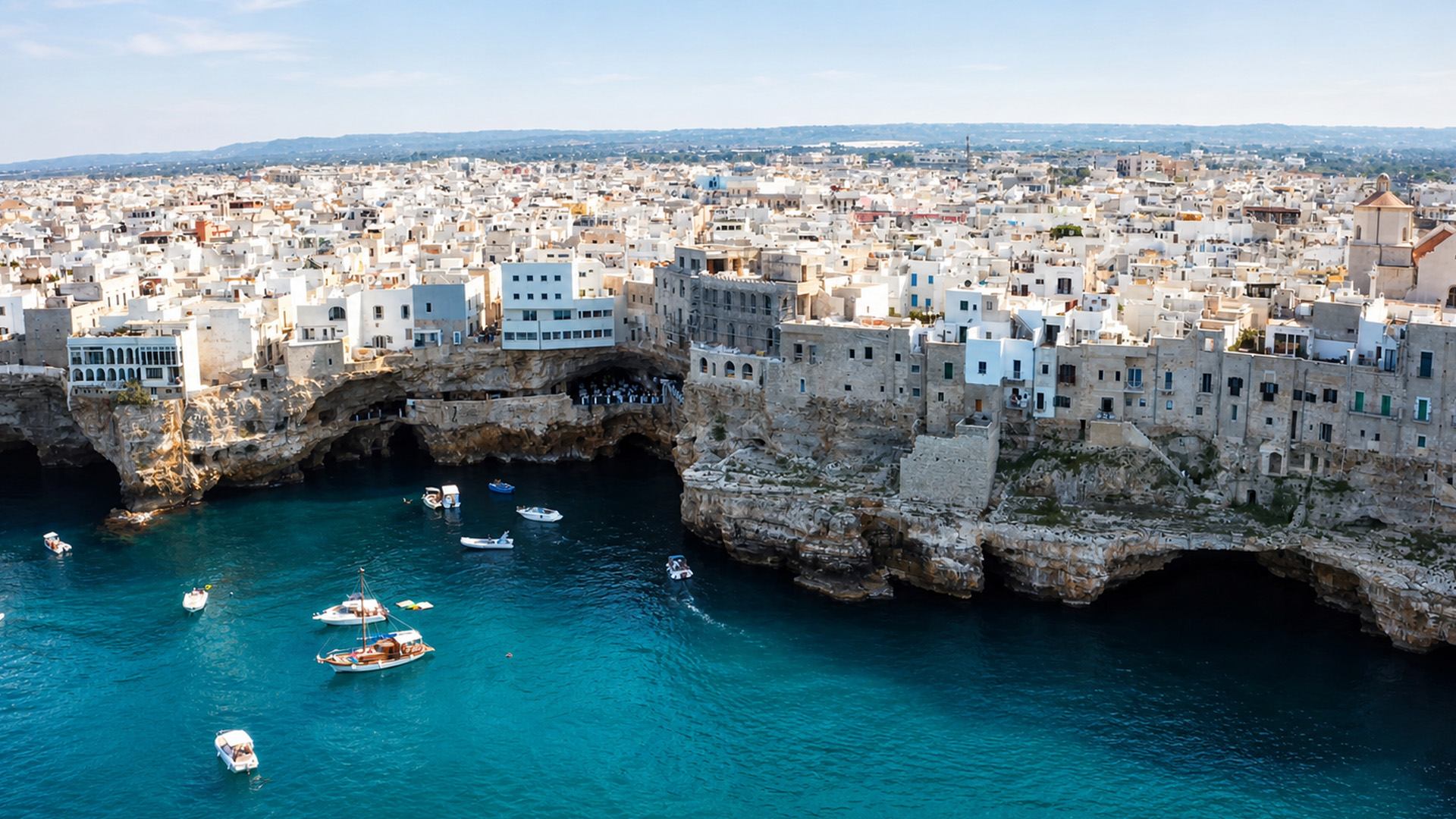 Why is this town built over sea caves?