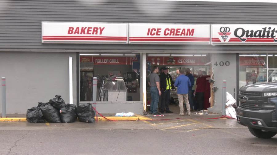 Police looking for driver after car crashed into Lansing Quality Dairy ...