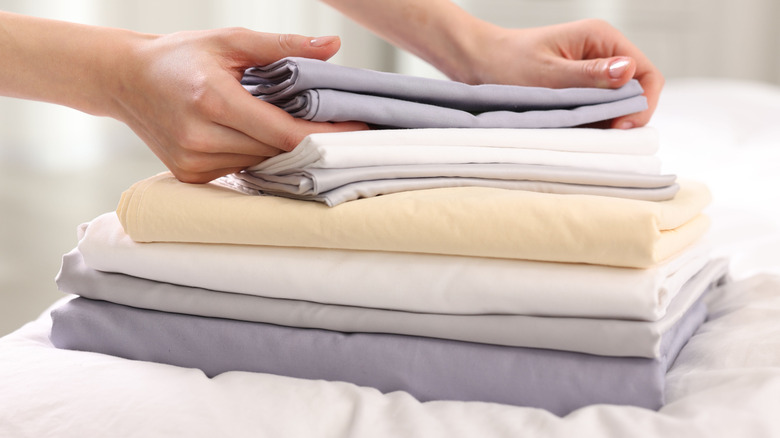 Stop overstuffing your linen closet: Keep spare linens organized outside it