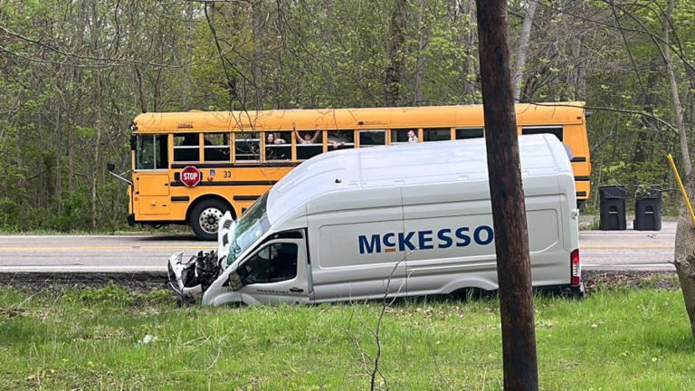 Van rear-ends school bus, 2 hospitalized