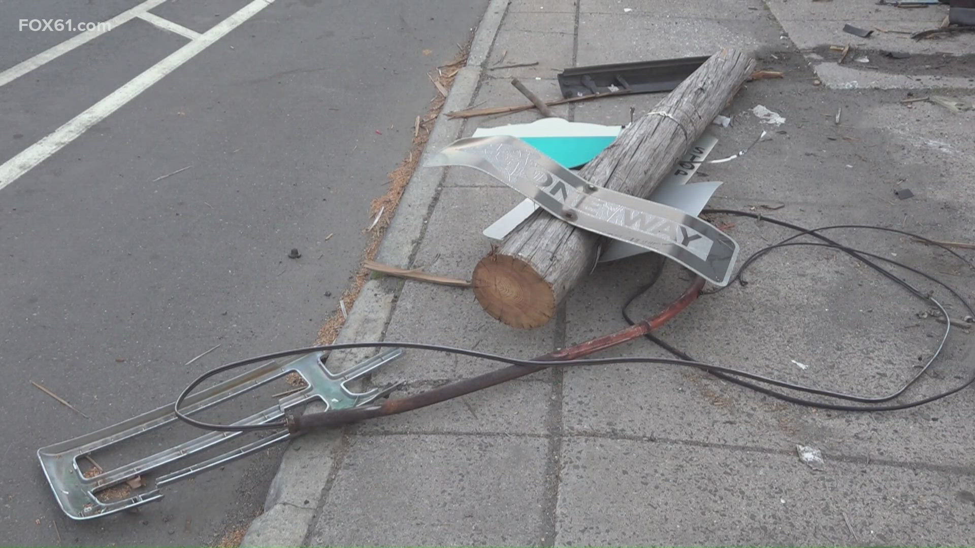 Pedestrian pinned under pickup truck in Hartford; light pole damaged