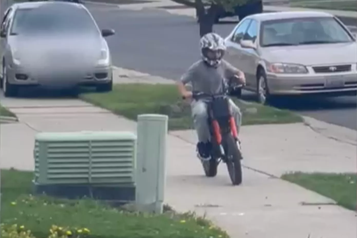 Woman accused of chasing kid on dirt bike down sidewalk in her car