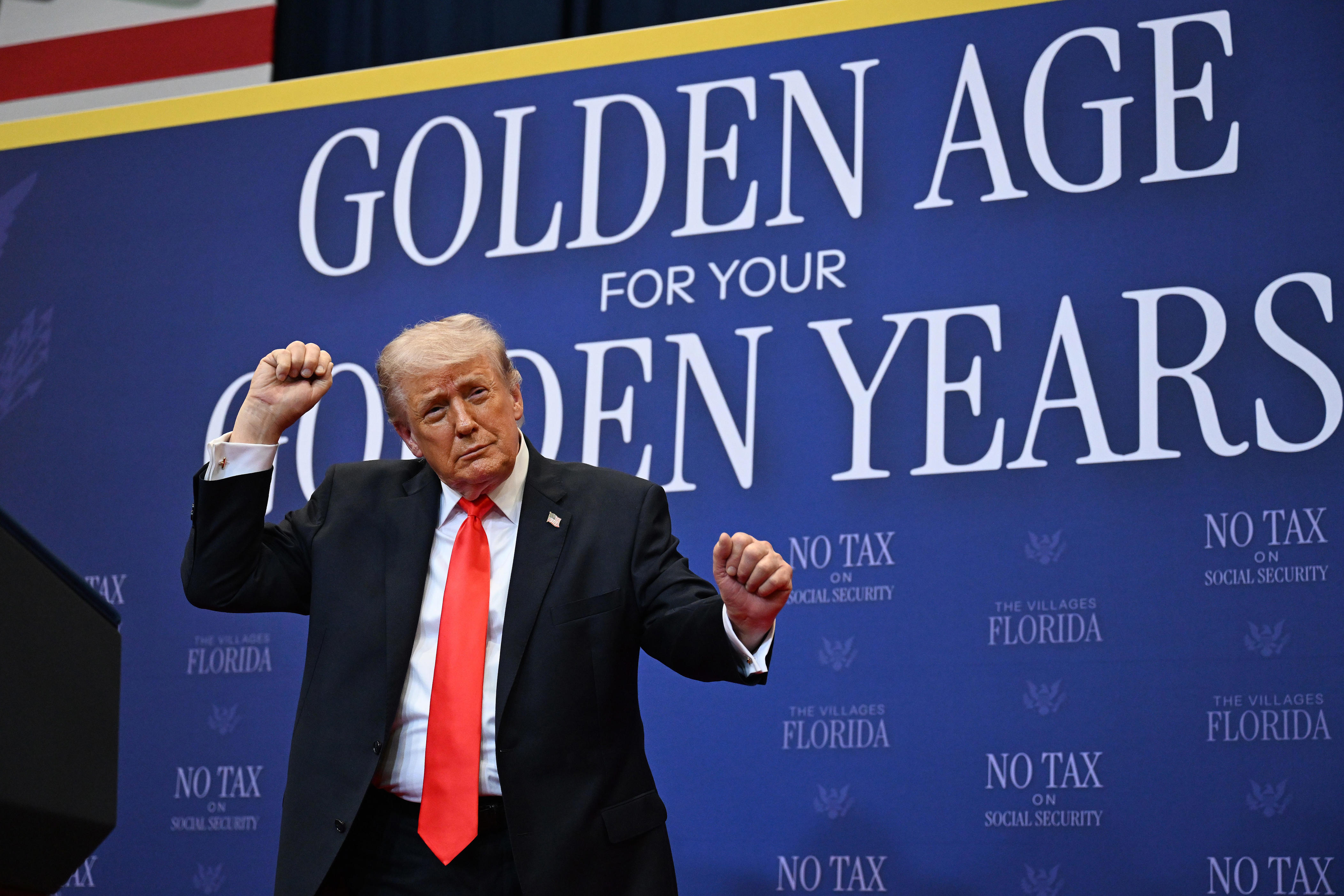 Watch Trump teach students his famous fist-pump dance