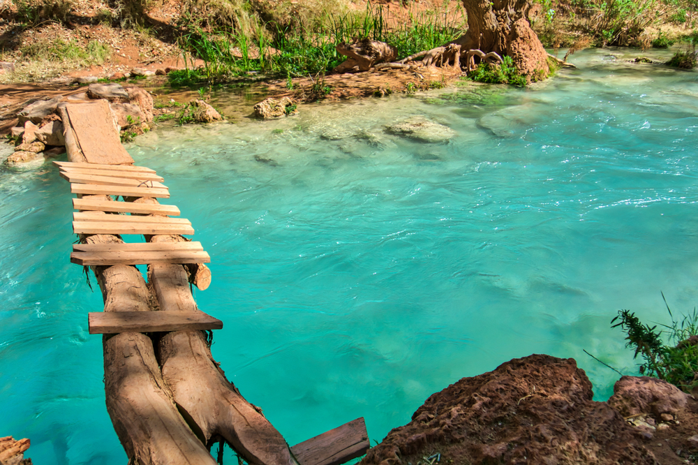 A 100-foot waterfall flows turquoise in Arizona and the only way in is ...