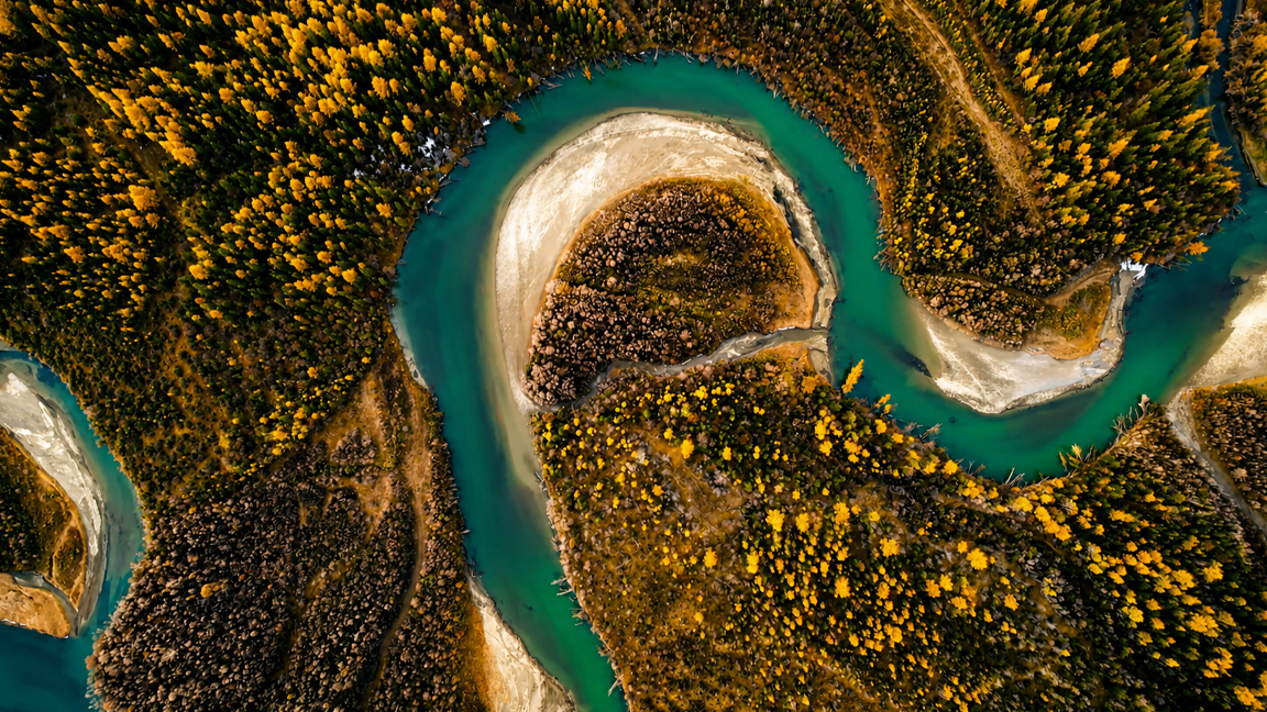Scenic aerial river bend with autumn foliage