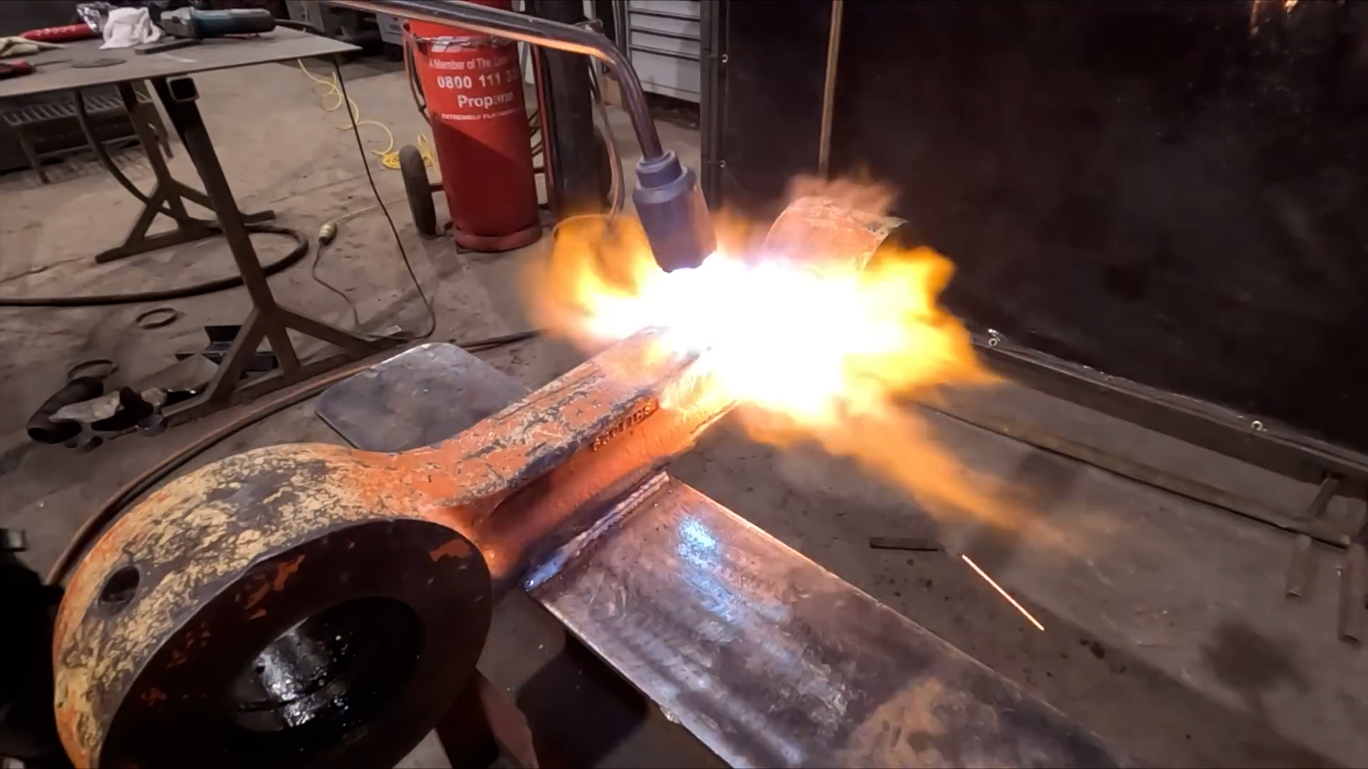 Intense oxy-fuel cutting on heavy steel component