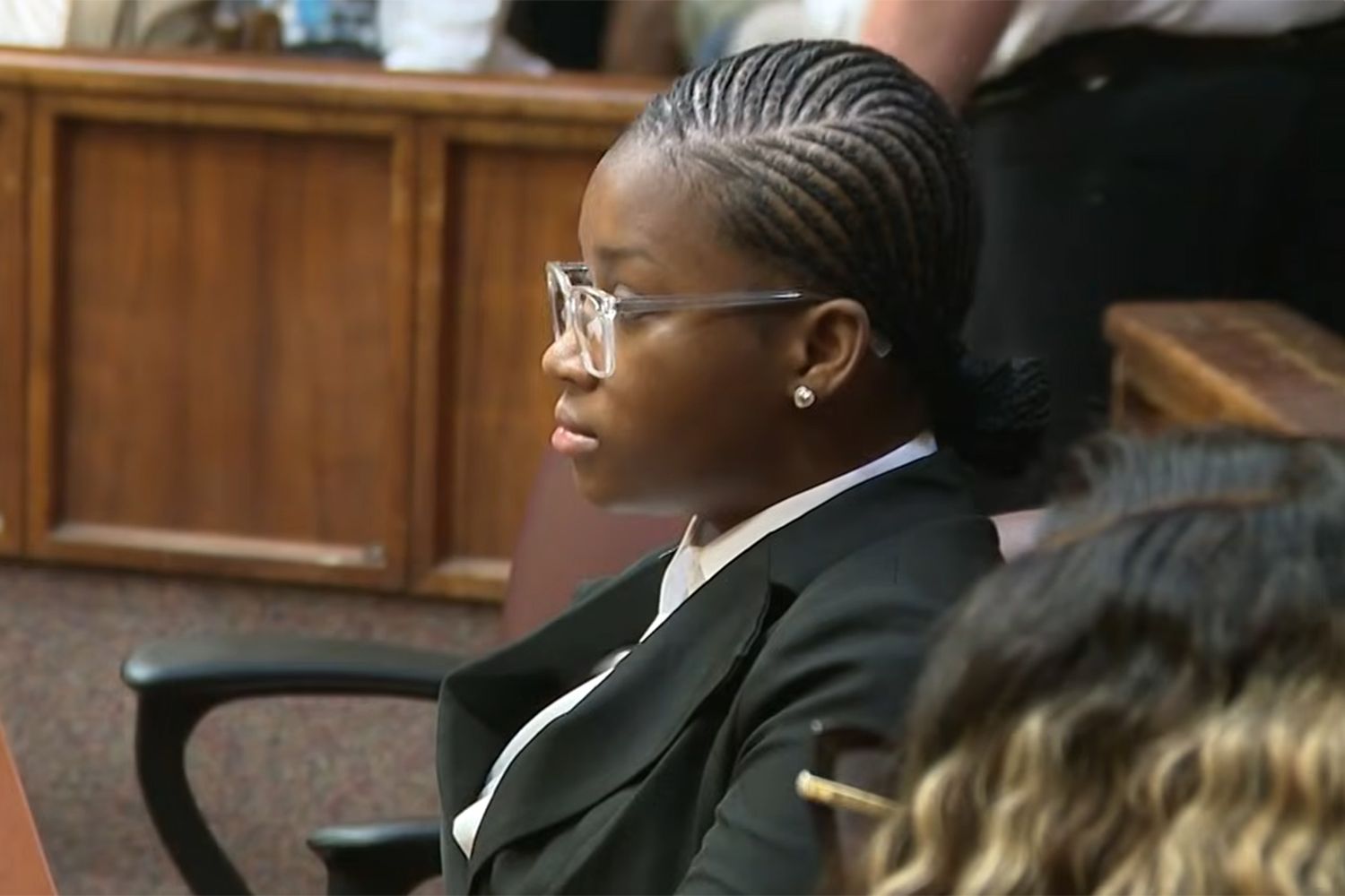 Teen who killed her high school football star boyfriend sentenced