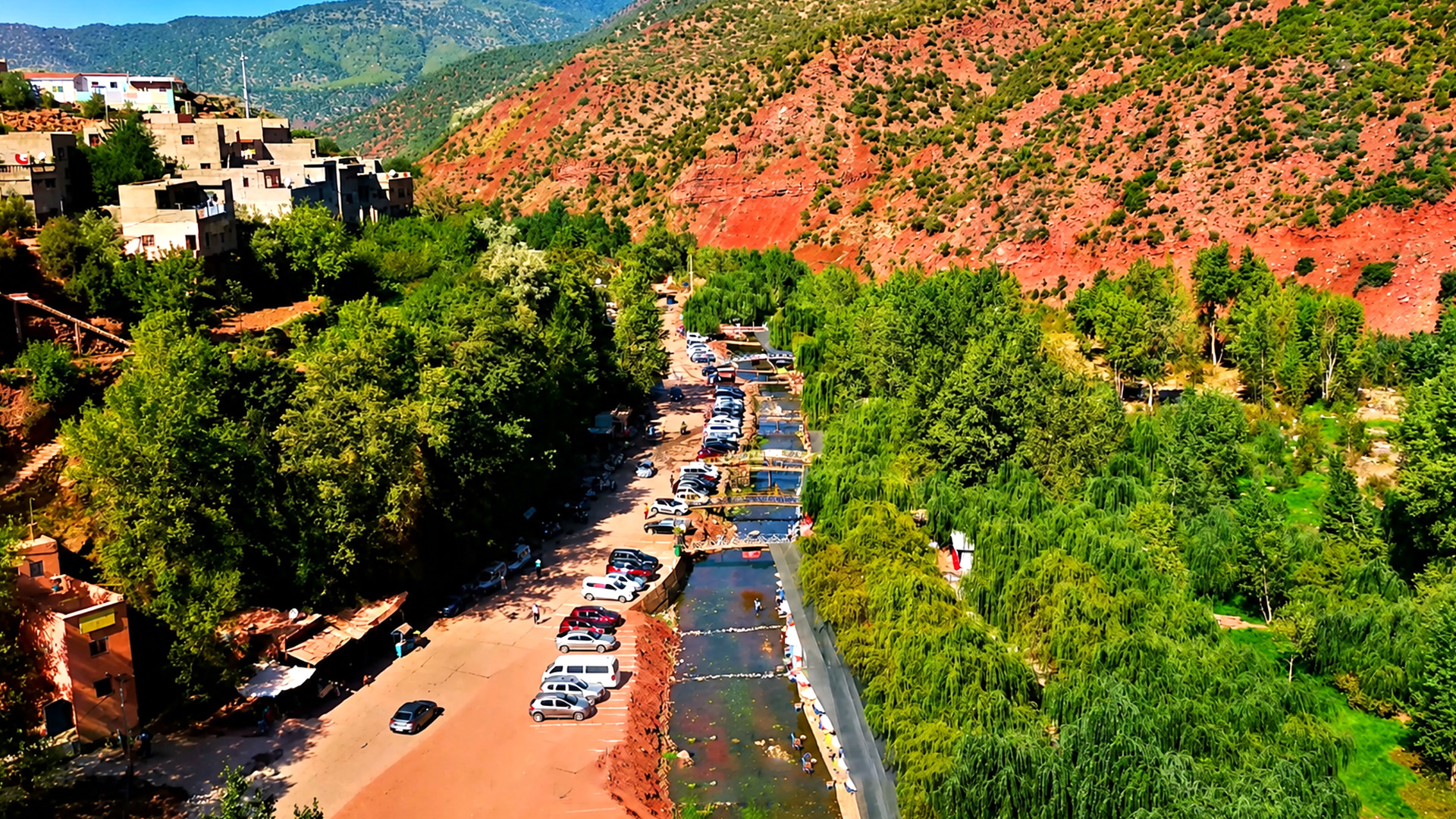 A hidden oasis contrasting Morocco’s red mountain terrain
