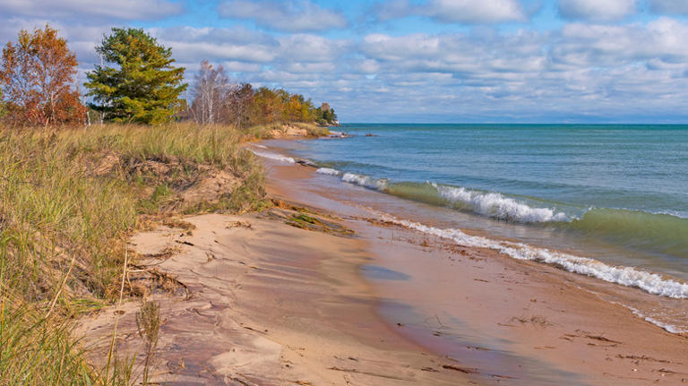 Nestled on Michigan's Sunrise Coast is a charming beach town nicknamed ...