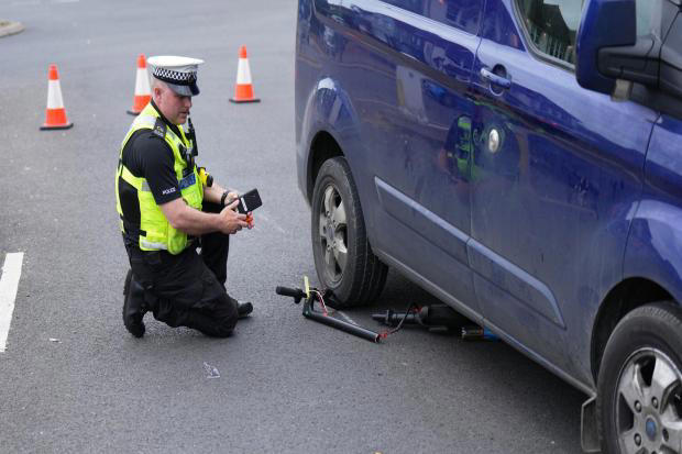 Van driver arrested and two girls injured after crash with e-scooter