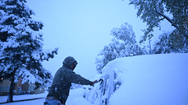 Surprise snow in May causing delight, delays and disruptions in Colorado