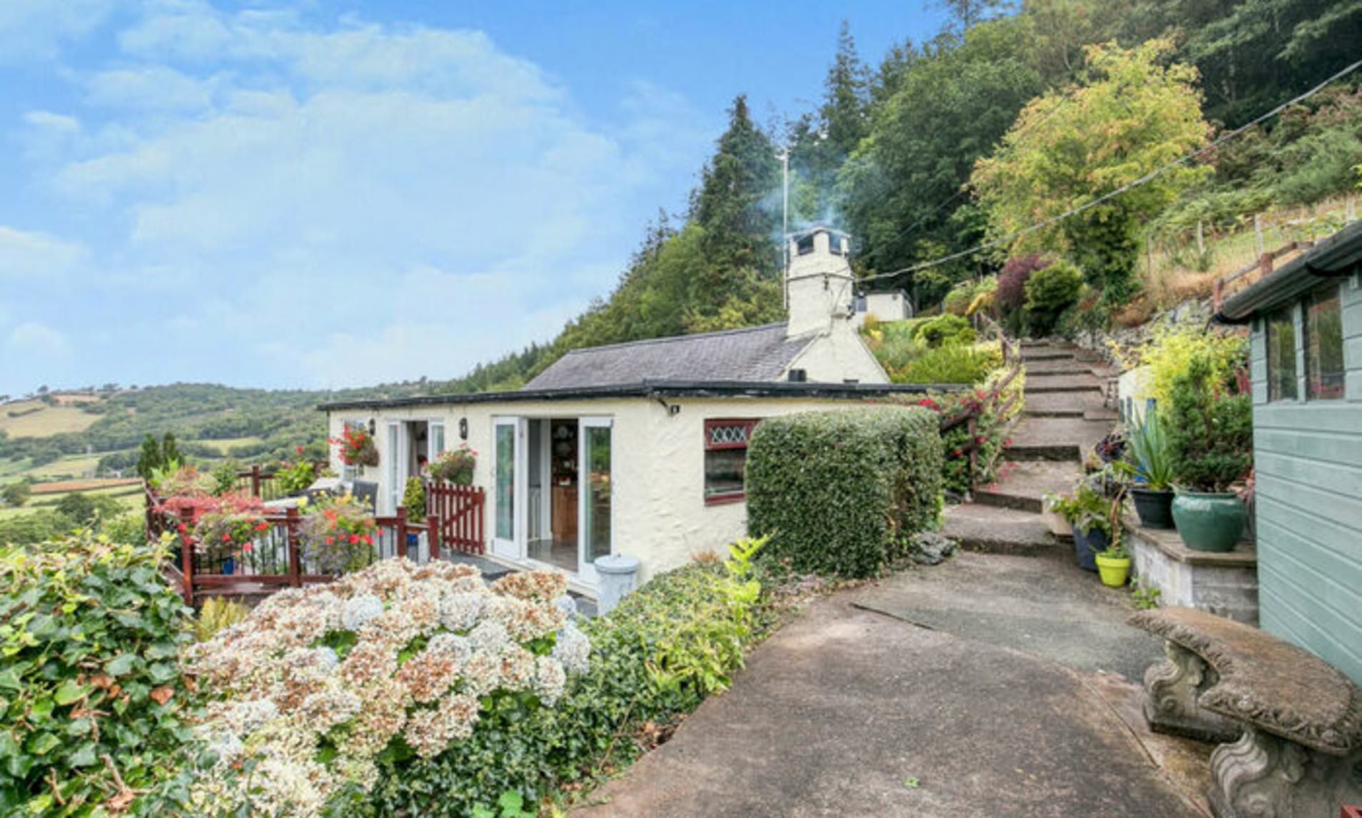 Inside modest Welsh bungalow where one of America's most wanted defied ...