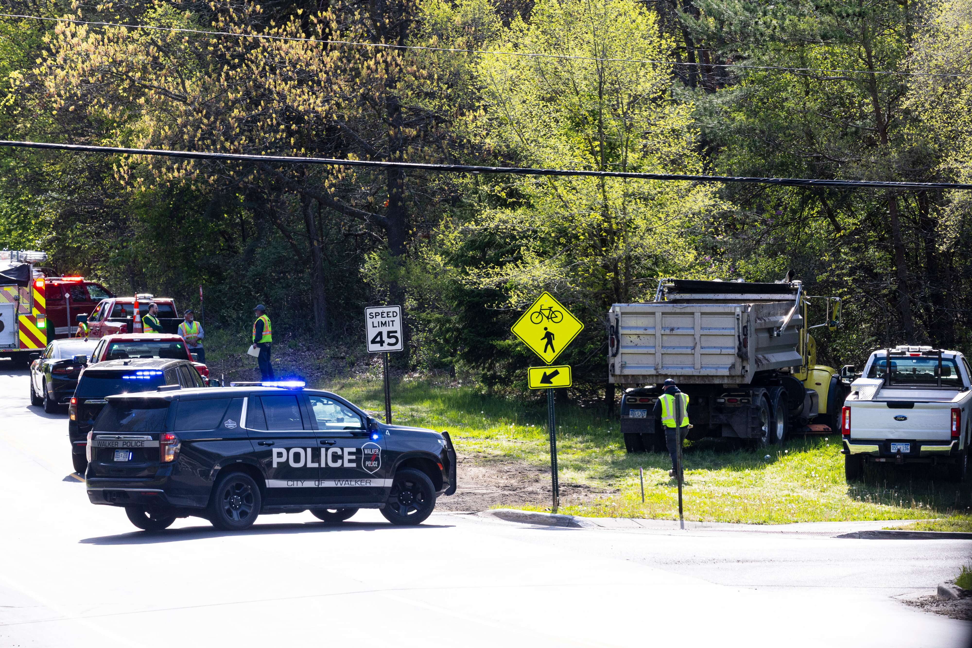 Driver hits construction equipment in Walker, rolls SUV