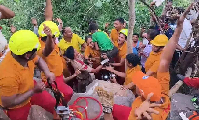 Firemen dodge python, bees to rescue teen trapped in jungle rocks in 6 ...