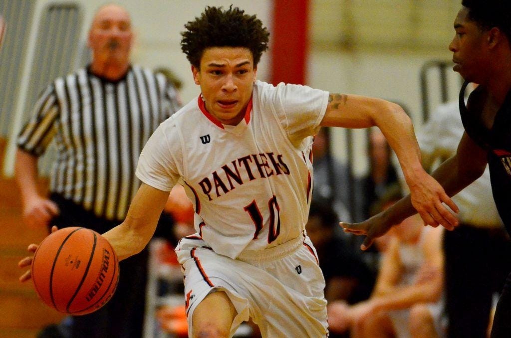 Northern Illinois hires Washington grad for men's basketball coaching staff