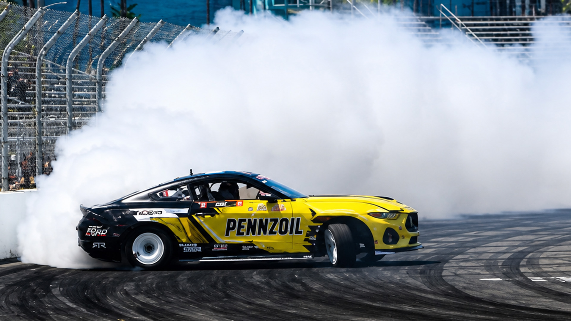 1200 HP Mustang drifting with heavy smoke