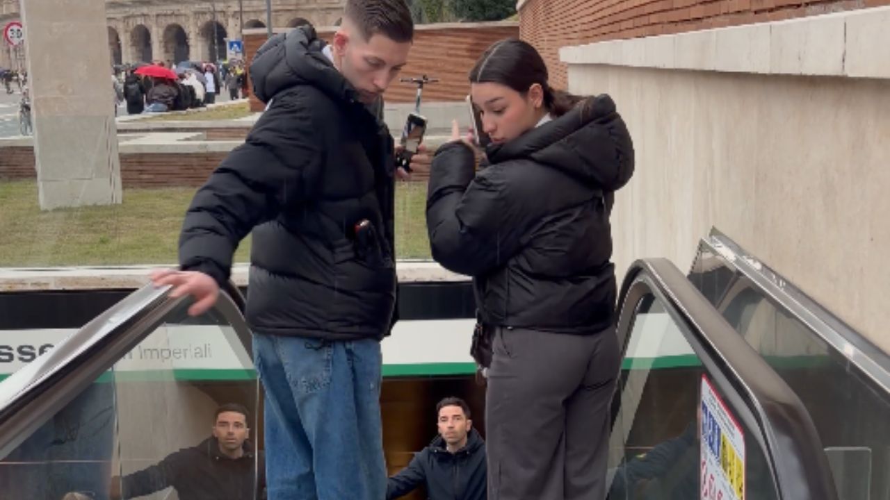 Girl falls on escalator while filming Colosseum in Rome