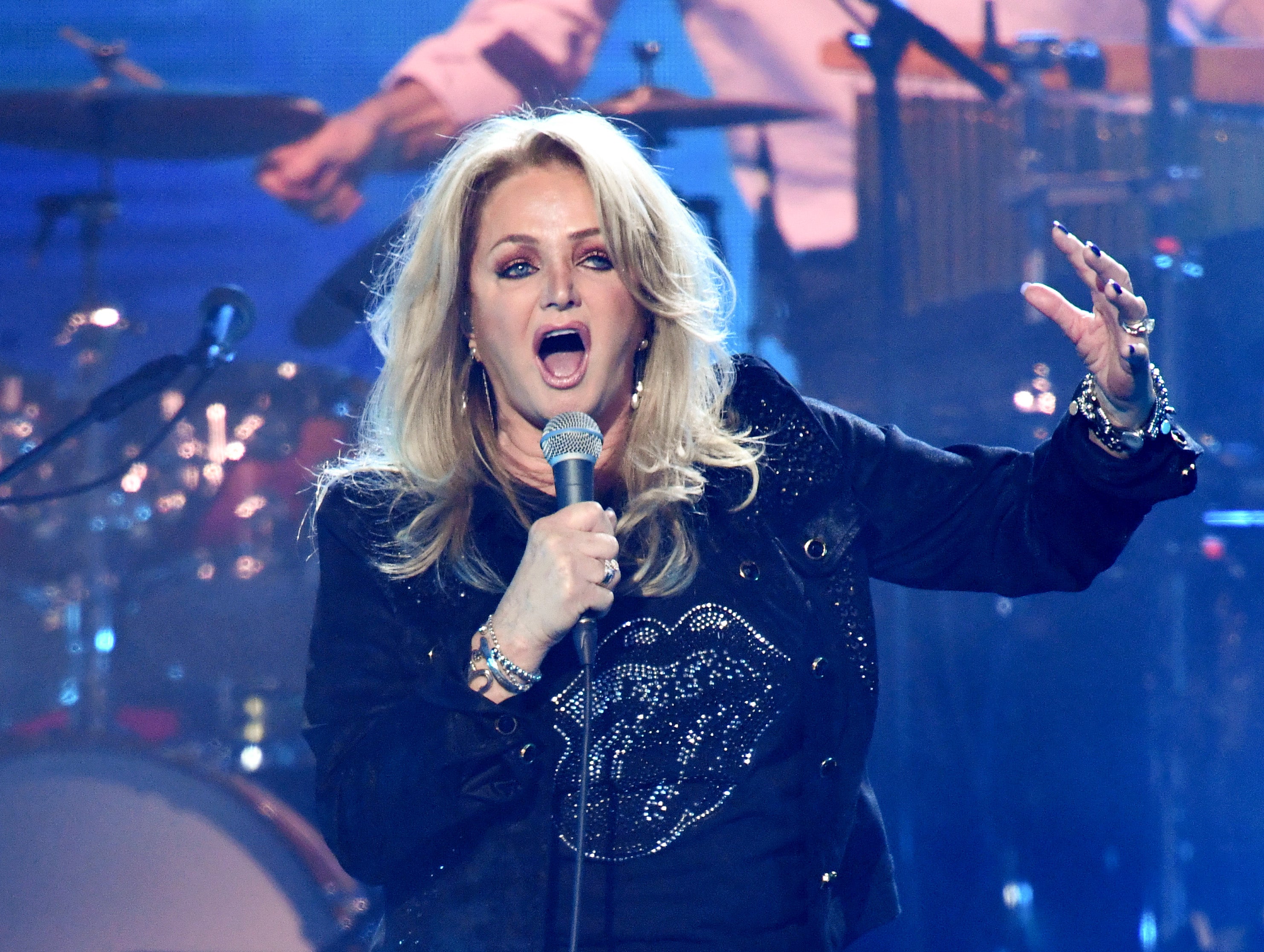 Bonnie Tyler is 'very unwell' but out of coma after surgery