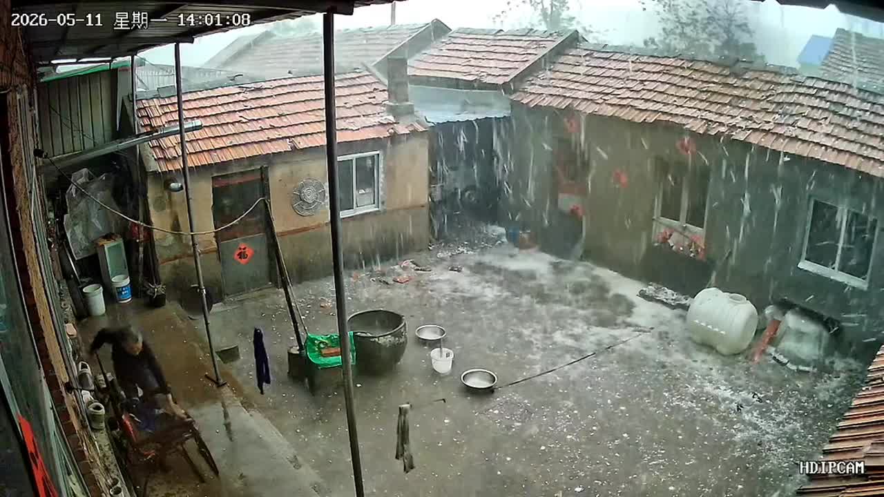 Hailstorm damages rooftops during severe weather in Guangdong, China