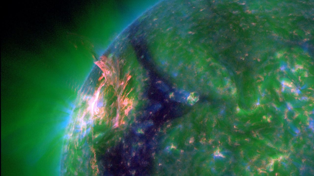 Eruption blows hole in sun's atmosphere, and could trigger northern lights