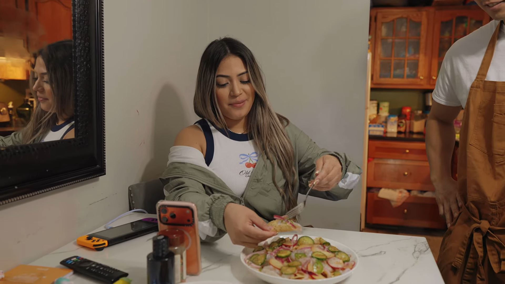 Paying for strangers groceries if they let us cook for them in their home!