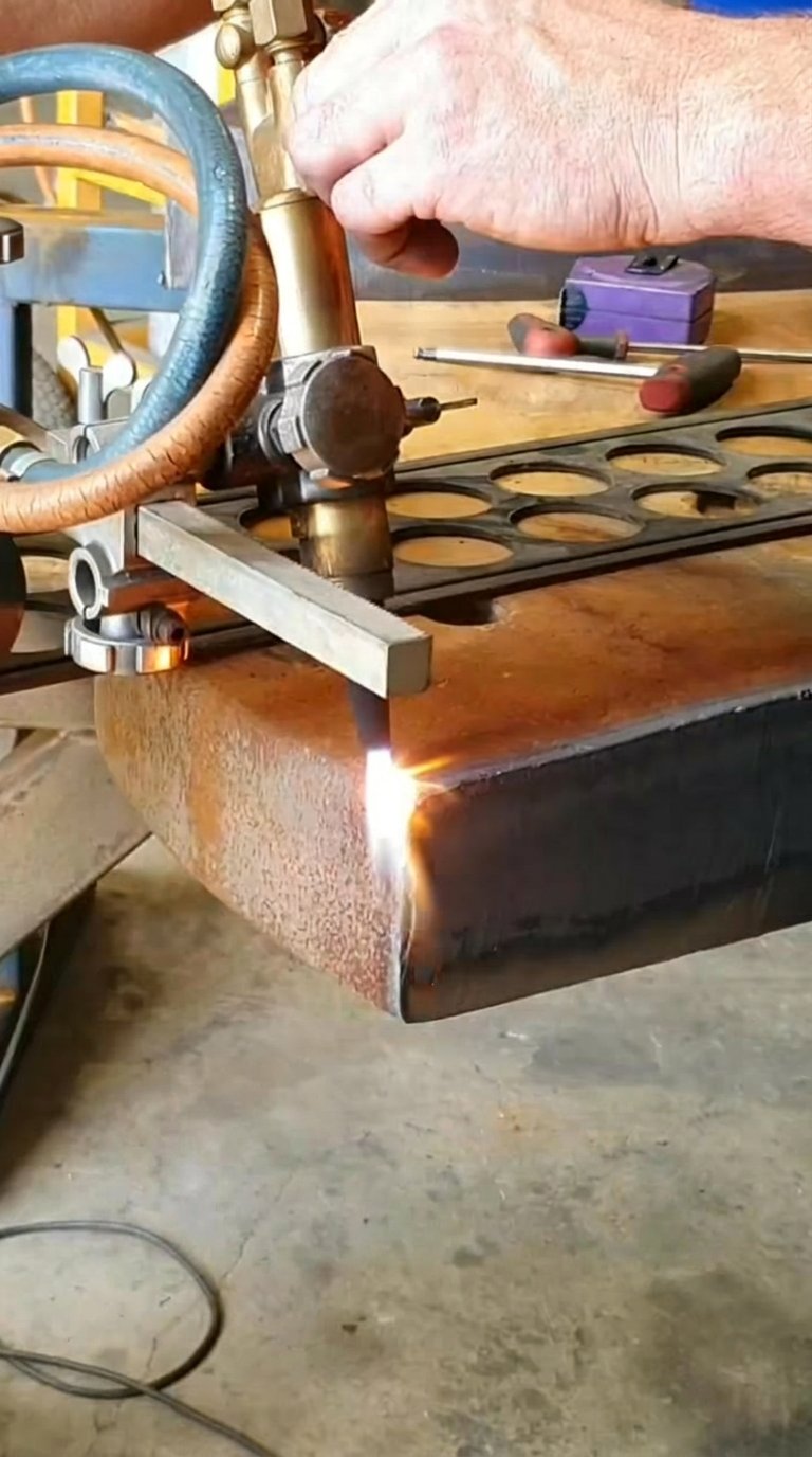 Oxy gas cutting on a D11 ripper shank