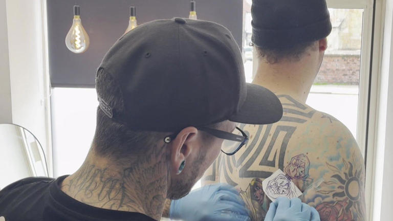 Marvel tattoo world record holder vows to carry on